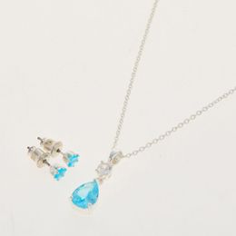 2-teiliges silberfarbenes Schmuckset mit blauen Zirkonia