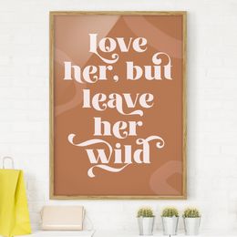 Bild mit Rahmen Sie bleibt wild - Spruch