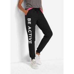 bonprix Jogginghose aus Baumwolle mit Druck Loose Fit, schwarz, mit Baumwolle