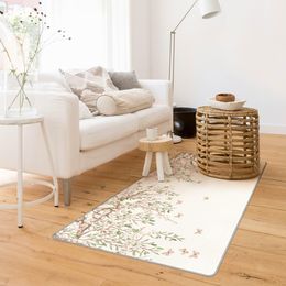 Teppich Kirschbl&uuml;te im Fl&uuml;gelspiel der Schmetterlinge