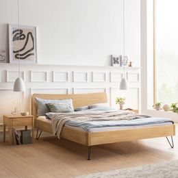 Pharao24.de 140x200 cm Bett Eiche hell aus Massivholz Vierfu&szlig;gestell aus Metall
