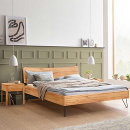 Pharao24.de Massivholz Bett 140x200 Wildbuche in modernem Design Vierfu&szlig;gestell aus Metall