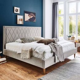 Pharao24.de Stoffbett Cremefarben Polster in modernem Design Vierfu&szlig;gestell aus Holz