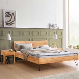 Pharao24.de Massivholz Bett 140x200 Wildbuche in modernem Design Vierfu&szlig;gestell aus Metall