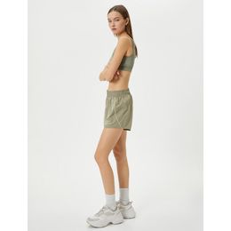 KOTON Shorts Damen Gr&ouml;&szlig;e 30 khaki / pastellgr&uuml;n