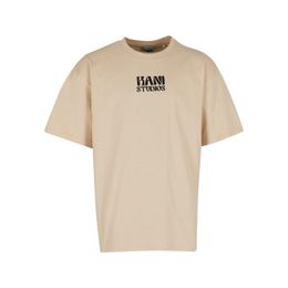 Karl Kani Damen T-Shirt "Karl Kani Kani Studios Print T-Shirt"beige, Gr. L, bedruckt, 100% Baumwolle, Shirts