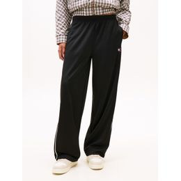 Trainingshose Tommy Jeans "TJW ARCHIVE TRACK PANT", Damen, Gr. XS (34), N-Gr, schwarz, Web, Obermaterial: 89% Polyester, 11% Elasthan, unifarben mit Farbeinsatz, relaxed fit kn&ouml;chellang, Hosen Trainingshose