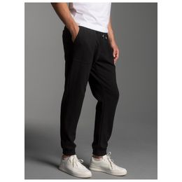 Jerseyhose TRIGEMA "TRIGEMA Jogginghose mit aufgesetzten Taschen", Damen, Gr. M, US-Gr&ouml;&szlig;en, schwarz, 55% Polyester, 45% Baumwolle, Hosen Jerseyhose