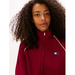 Tommy Jeans Damen Yoga-Sweatjacke "TJW BADGE TRACK JACKET EXT"lavish cerise, Gr. M, unifarben mit Farbeinsatz, Sweatware, Obermaterial: 89%