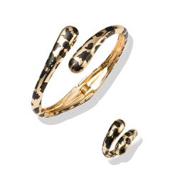 Schmuckset Firetti "Multipack Schmuck Geschenk Kupfer Ring Armreif Animalprint", gelbgoldfarben, schwarz, Schmuck_Sets, Damen, Kupfer, gl&auml;nzend, Schmuckset, Made in Germandy