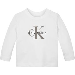Langarmshirt Calvin Klein Jeans "MONOGRAM LS T-SHIRT", M&auml;dchen, Gr. 86, hellwei&szlig;, Jersey, Obermaterial: 93% Baumwolle, 7% Elasthan, unifarben, regular fit h&uuml;ftlang, Rundhals, eingesetzt abgesteppte Kante, Shirts Langarmshirt, f&uuml;r Babys bis 2 Jahre, Logo-Druck