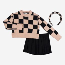 3-teiliges schwarz-beiges Set aus Pullover und Rock