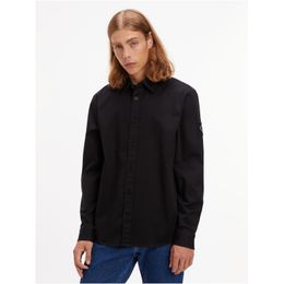 Langarmhemd Calvin Klein Jeans "MONOLOGO BADGE RELAXED SHIRT", Herren, Gr. L, N-Gr, schwarz (ck schwarz), Web, Obermaterial: 97% Baumwolle, 3% Elasthan, relaxed fit, Manschette, Hemden Langarmhemd