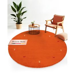 Wollteppich CarpetFine "Gabbeh Uni", orange, H:15mm &Oslash;:150cm, Wolle, Teppiche, Wollteppich, reine Wolle handgewebt, Gabbeh Tiermotiv warmes Raumklima viele Gr&ouml;&szlig;en