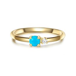 Glanzst&uuml;cke M&uuml;nchen Glanzst&uuml;cke M&uuml;nchen Ring aus Sterling Silber mit Zirkonia und T&uuml;rkis in gelbgold | Gr.: 60