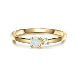 Glanzst&uuml;cke M&uuml;nchen Glanzst&uuml;cke M&uuml;nchen Ring aus Sterling Silber mit Zirkonia und Opal in gelbgold | Gr.: 58