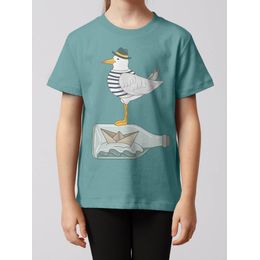 wat? Apparel T-Shirt M&ouml;we mit Hut in Teal Monstera | Gr.: 98/104