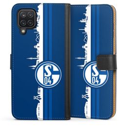 DeinDesign Galaxy A12 Handy Klapph&uuml;lle Handyh&uuml;lle aus Kunst Leder schwarz Flip Case Official Licensed Product Fc Schalke 04 Skyline Sideflip mit langer Lasche