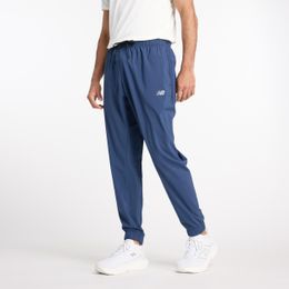 New Balance Herren Trainingshose "Sport Essentials Woven Jogger", blau, Gr. XL, Obermaterial: 100% Polyester, Hosen