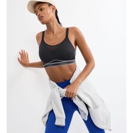 Sport-BH triaction by Triumph "Triaction Cardio Air", Damen, Gr. 75, Cup F, schwarz, Mesh;Single Jersey, Obermaterial: 43% Polyester, 38% Polyamid, 19% Elasthan, BHs Sport-BH, atmungsaktiv und extremer Halt ohne B&uuml;gel