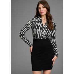 Jerseykleid Bruno Banani, Damen, Gr. 42, N-Gr, schwarz (schwarz, gemustert), Milano Rib, Obermaterial: 70% Viskose, 25% Polyester, 5% Elasthan. Top: 95% Polyester, 5% Elasthan, bedruckt, gemustert, figurbetont kniefrei, tiefer V-Ausschnitt, Kleider Jerseykleid, mit eleganter Wickeloptik und Print