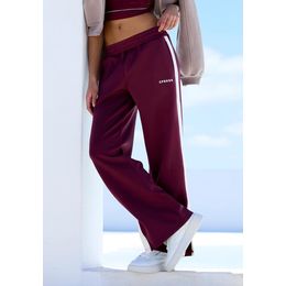Copenhagen Studios Relaxhose rot Gr. S (36/38) f&uuml;r Damen. Mit Logodruck, Druckkn&ouml;pfe, Logoschriftzug, Kontraststreifen. Bequem. Nachhaltig.