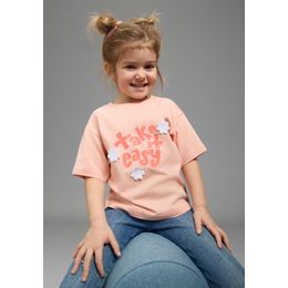 Kidsworld M&auml;dchen T-Shirt "mit s&uuml;&szlig;en Druck und H&auml;ckelblumen"aprikot, Gr. 140, bedruckt, gebl&uuml;mt, Single Jersey, Obermaterial: 100% Baumwolle, Shirts,