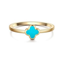 Glanzst&uuml;cke M&uuml;nchen Glanzst&uuml;cke M&uuml;nchen Ring Kleeblatt aus Edelstahl mit T&uuml;rkis (synth.) in gelbgold | Gr.: 58