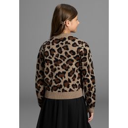 Kidsworld M&auml;dchen Strickjacke "Strickjacke mit Leo-Muster"gemustert leo, Gr. 104, Feinstrick, Obermaterial: 100% Polyacryl, Strickjacken, Strickjacke