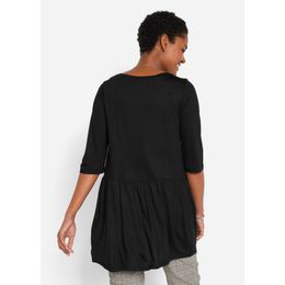 bonprix Damen Longshirtschwarz, Gr. 44, unifarben, Jersey, Obermaterial: 100% Viskose, Shirts, bequeme A-Linien-Passform mit angesetztem Volant,