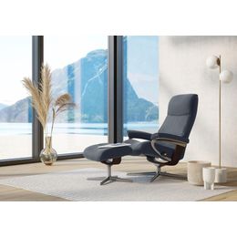 Fu&szlig;hocker stressless "View", blau (atlantic blau batick), B:57cm H:43cm T:47cm, Leder BATICK: BATICK ist ein leicht korrigiertes, durchgef&auml;rbtes und genarbtes M&ouml;belleder, bei dem die meisten Unebenheiten und Spuren in der Regel entfernt wurden., Hocker, Fu&szlig;hocker, mit Cross Base, Gr&ouml;&szlig;e S, M & L, Holzakzent Braun