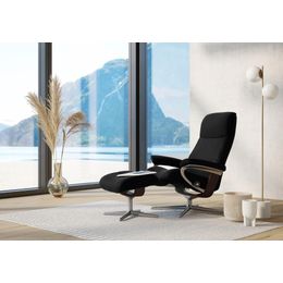 Fu&szlig;hocker stressless "View", schwarz (schwarz batick), B:57cm H:43cm T:47cm, Leder BATICK: BATICK ist ein leicht korrigiertes, durchgef&auml;rbtes und genarbtes M&ouml;belleder, bei dem die meisten Unebenheiten und Spuren in der Regel entfernt wurden., Hocker, Fu&szlig;hocker, mit Cross Base, Gr&ouml;&szlig;e S, M & L, Holzakzent Braun