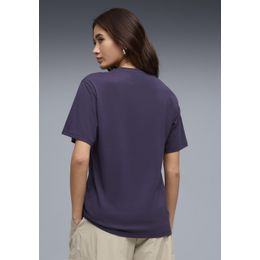 Puma Damen T-Shirt "GRAPHICS RELAXED FLOWER TEE", lila, Gr. S, bedruckt, Jersey, Obermaterial: 100% Baumwolle, Shirts, lockere Passform, Kurzarm,