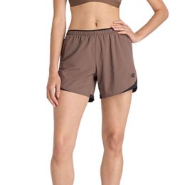 New Balance RC Essential Short 5" Bekleidung Damen braun M