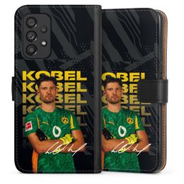 DeinDesign Galaxy A53 5G Handy Klapph&uuml;lle Handyh&uuml;lle aus Kunst Leder schwarz Flip Case Borussia Dortmund Bvb Gregor Kobel Sideflip mit langer Lasche