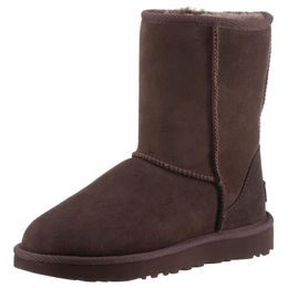 UGG Australia Winterboots UGG "Unisex Classic Short 2", Damen, Gr. 8 (39), braun (dunkelbraun), Obermaterial: 100% Lammfell. Decksohle: 100% Lammfell. Laufsohle: 100% EVA/Kautschuk, unifarben, Schuhe Winterboots, Stiefel, Schlupfstiefel in klassischem Design