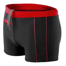 Badehose AQUARTI "Badehose Aquarti Herren Badehose Kurz mit Kontrastpaspel", Gr. M, N-Gr, grau (010 schwarz, rot), Obermaterial: 80% Polyamid PA. 20% Elasthan EL., Badehosen Badehose