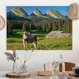 Bilderwelten Akustikbild Natur gr&uuml;n Motiv Schallschutzbild - Schweizer Almwiese mit Kuh - Berg Wohnzimmer Schlafzimmer