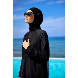 Schwarzer Burkini mit vollfl&auml;chiger Badebekleidung und T&uuml;lldetail