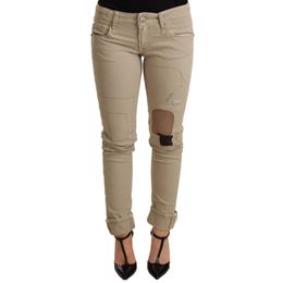 Acht Skinny Jeans mit distressed Patch-Details