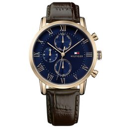 Die Tommy Hilfiger Herrenuhr ist das perfekte Geschenk, um sich selbst oder einen geliebten Menschen zu verw&ouml;hnen. Das runde Geh&auml;use aus Edelstahl wird von einem hochwertigen Quarzwerk im Multi-Cadrans-Stil angetrieben. Diese Dressed-Uhr hat einen Durchmesser von 44 mm. Das braune Lederarmband mit Dornschlie&szlig;e macht sie zu einer angenehm zu tragenden Uhr. Bei 3 bar ist diese Uhr nicht nur modisch,