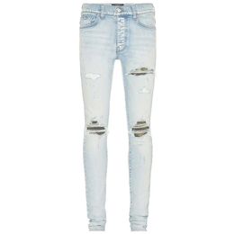 Amiri MX1 Camo Light Indigo Blue Jeans