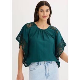 Langarmbluse bonprix, Damen, Gr. 50, gr&uuml;n (tiefgr&uuml;n), Obermaterial: 100% Polyester. Spitze: 100% Polyester, figurumspielend, Blusen, figurumspielende Passform, aus Polyester, mit Applikationen