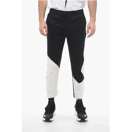 Neil Barrett Skinny Fit MODERNIST Sweatpants mit Kontrastdetails in Schwarz