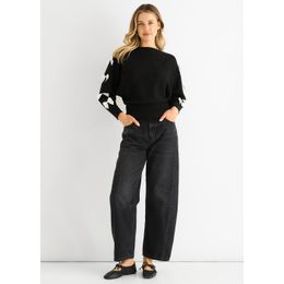 Schwarzer Pullover mit Schr&auml;gschnitt am Ausschnitt und Schleife
