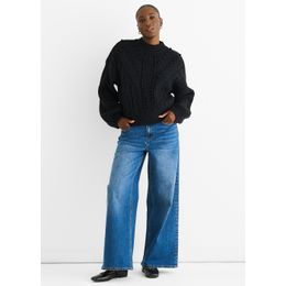 Schwarzer Grobstrick-Pullover in &Uuml;bergr&ouml;&szlig;e