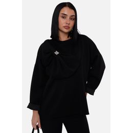 Schwarzes Pullover-Top mit kontrastierender Schleife in &Uuml;bergr&ouml;&szlig;e