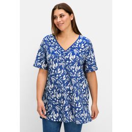 sheego Gro&szlig;e Gr&ouml;&szlig;en T-Shirt mit Blumendruck, in leichter A-Linie, blaubeere-gemustert, Gr&ouml;&szlig;e 56/58 - Damen