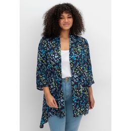 sheego Gro&szlig;e Gr&ouml;&szlig;en Longbluse mit Bl&auml;tterdruck, in Zipfelform, tiefblau-bedruckt, Gr&ouml;&szlig;e 50 - Damen