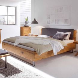 Pharao24.de Bett aus Wildeiche Massivholz mit gepolstertem Kopfteil 147x85x216 cm Pharao24